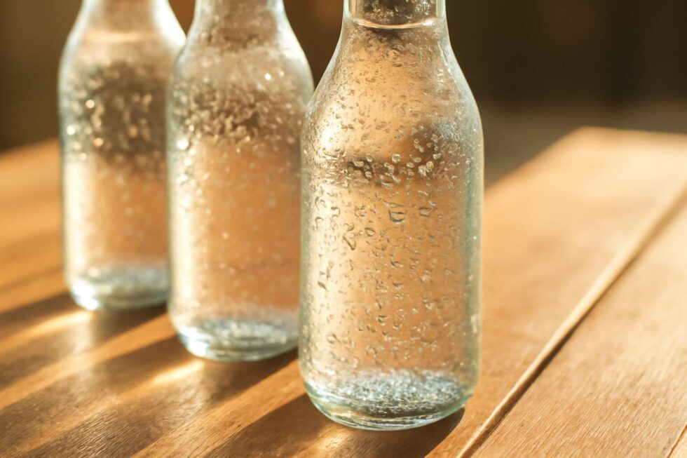 Elevate your sip with glass bottles of sparkling water on every table ...